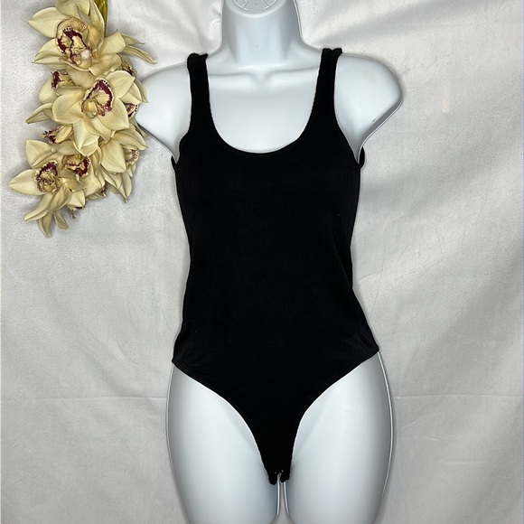 Tops | 325 Nwot Stretch Ribbed Tank Bodysuit | Poshmark
